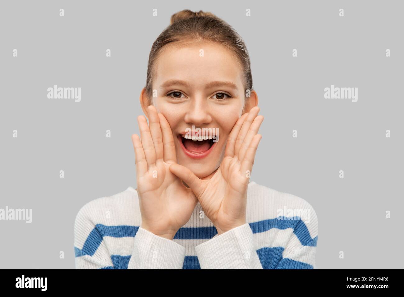 happy teenage girl calling someone Stock Photo - Alamy