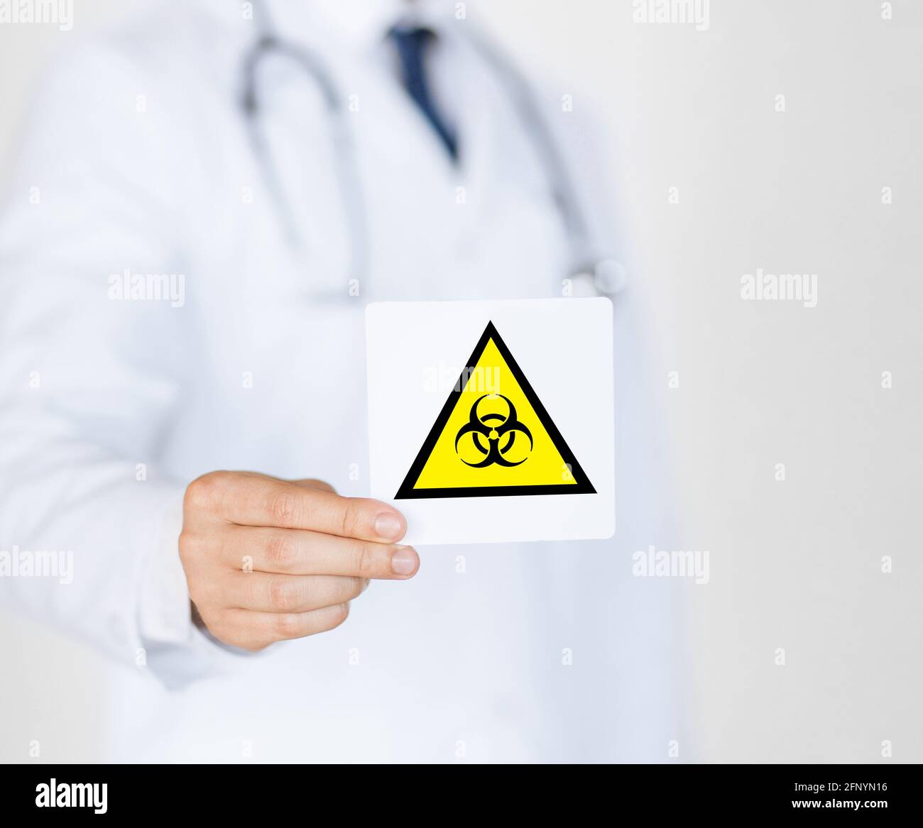 Doctor holding sign viral hi-res stock photography and images - Alamy