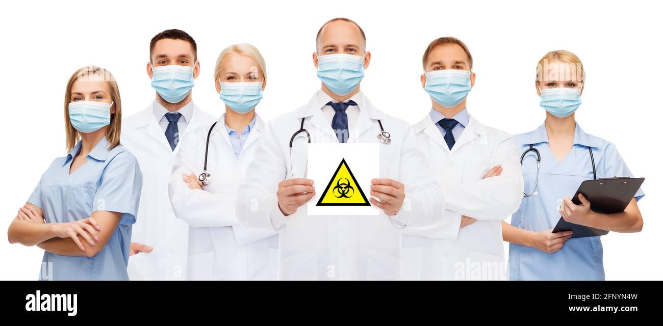 doctors in medical masks with biohazard sign Stock Photo - Alamy