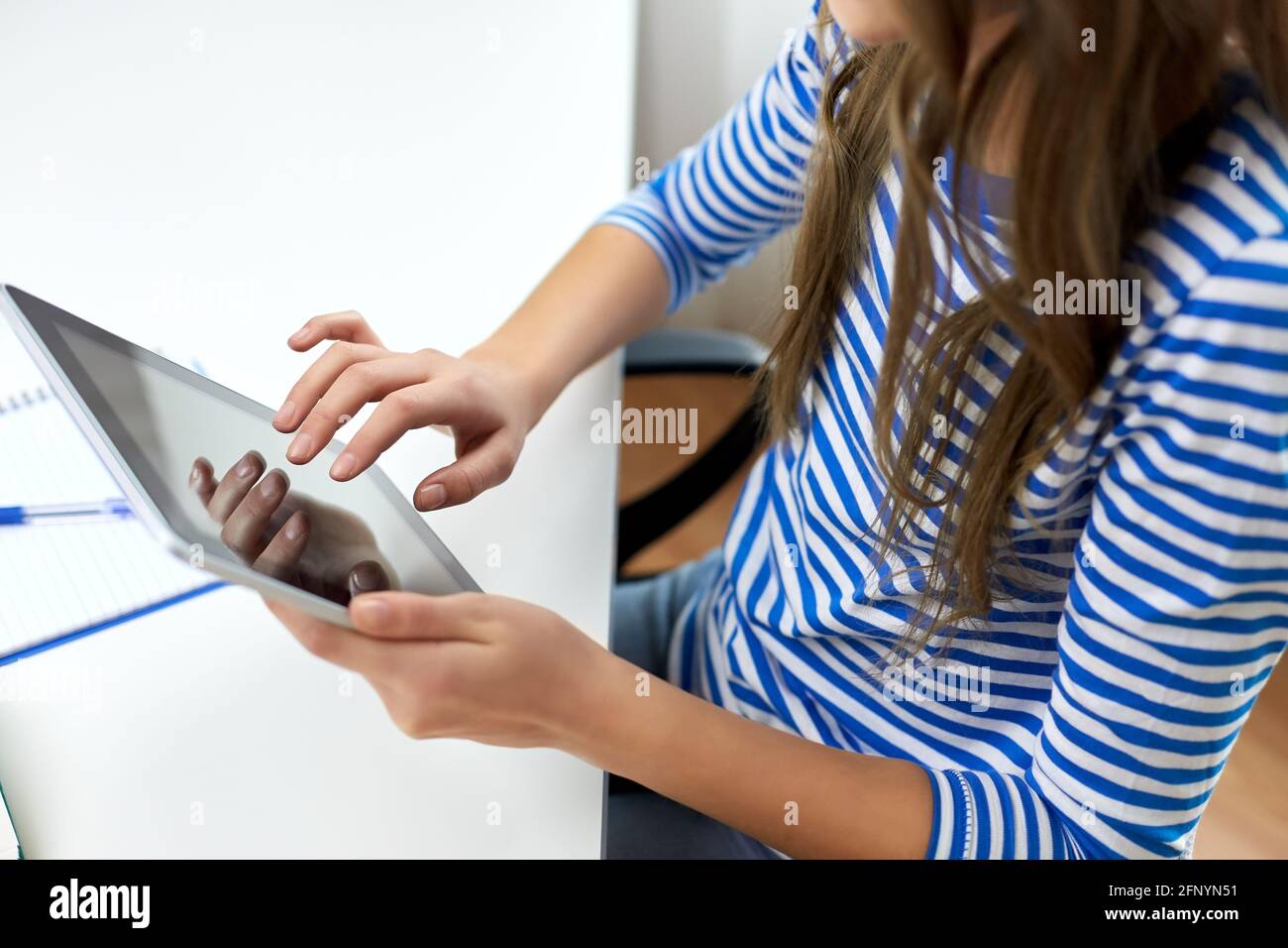 student girl using tablet pc computer at home Stock Photo - Alamy