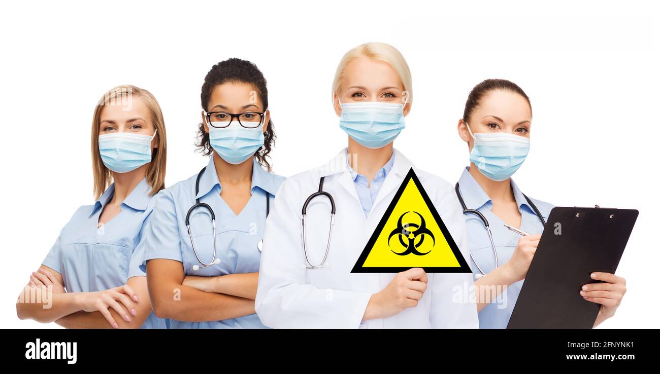 female doctor and nurses with biohazard sign Stock Photo - Alamy