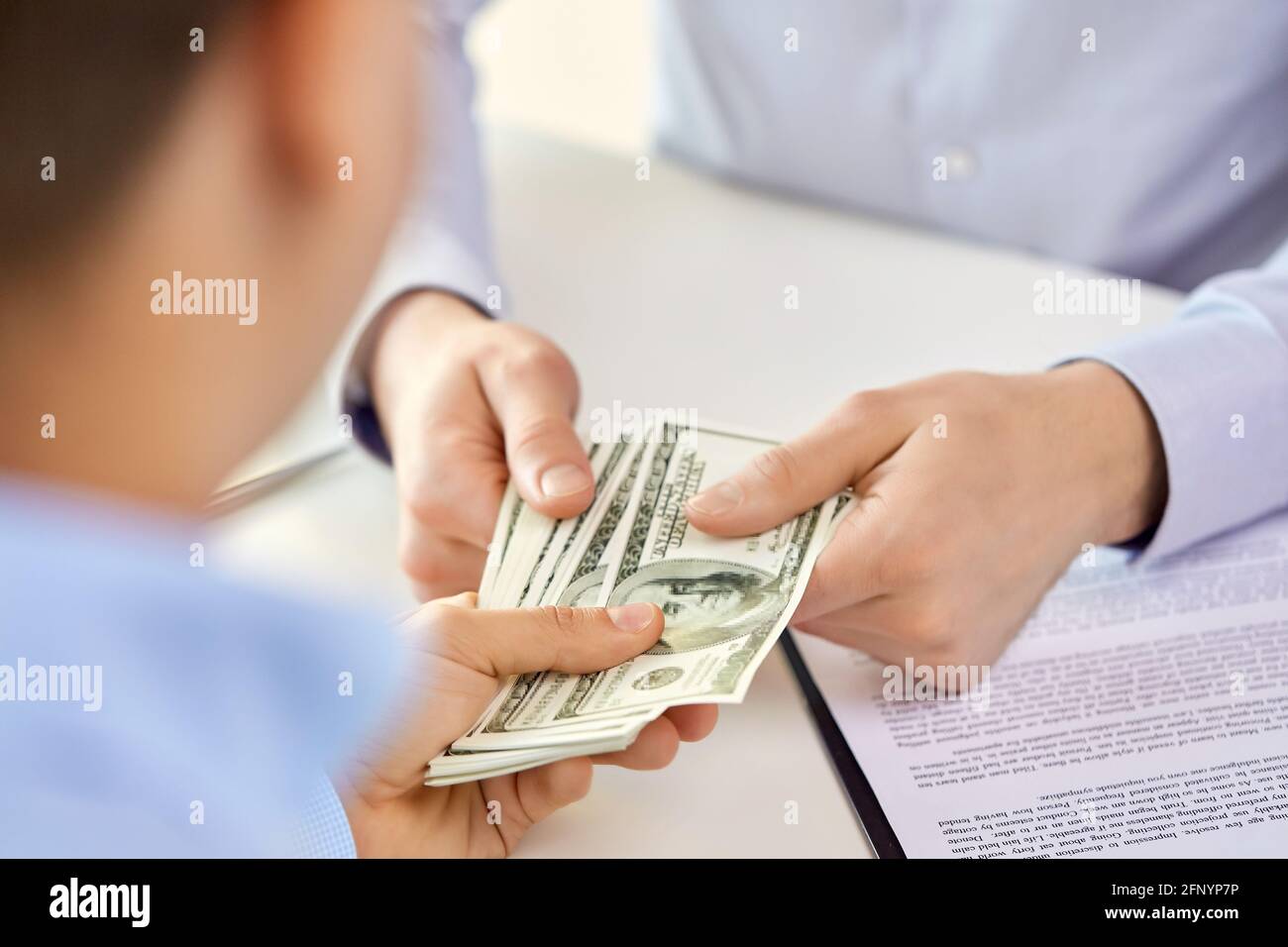 Money contract hand hi-res stock photography and images - Alamy