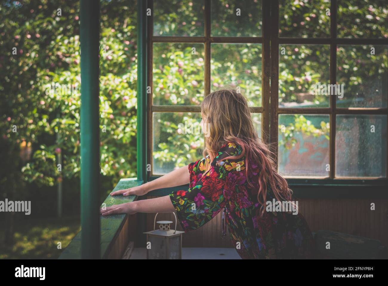 cute child in green romantic garden in romantic afternoon Stock Photo ...