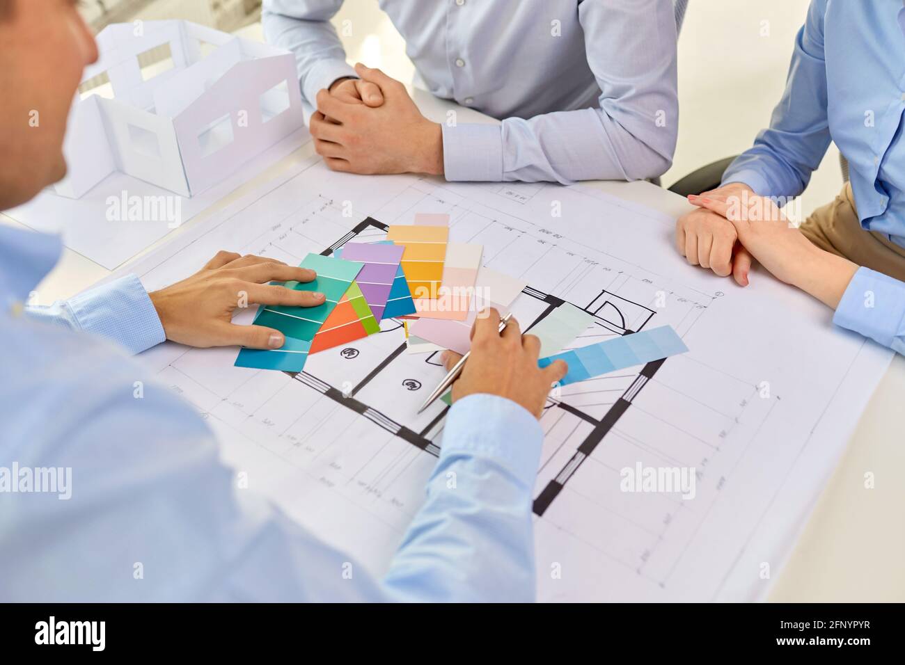 close up of designers team working with blueprint Stock Photo - Alamy