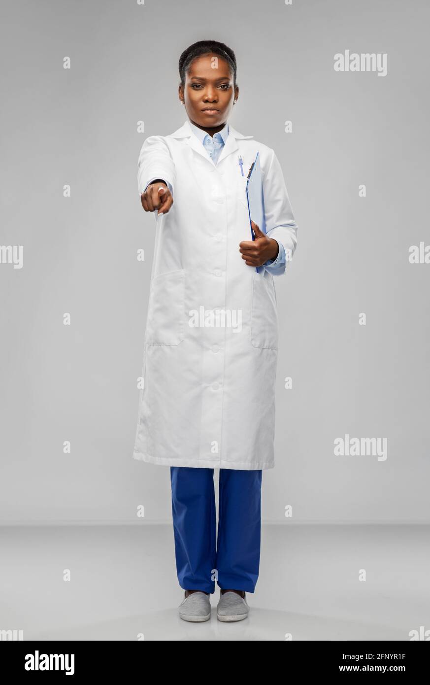 african female doctor pointing finger to camera Stock Photo - Alamy