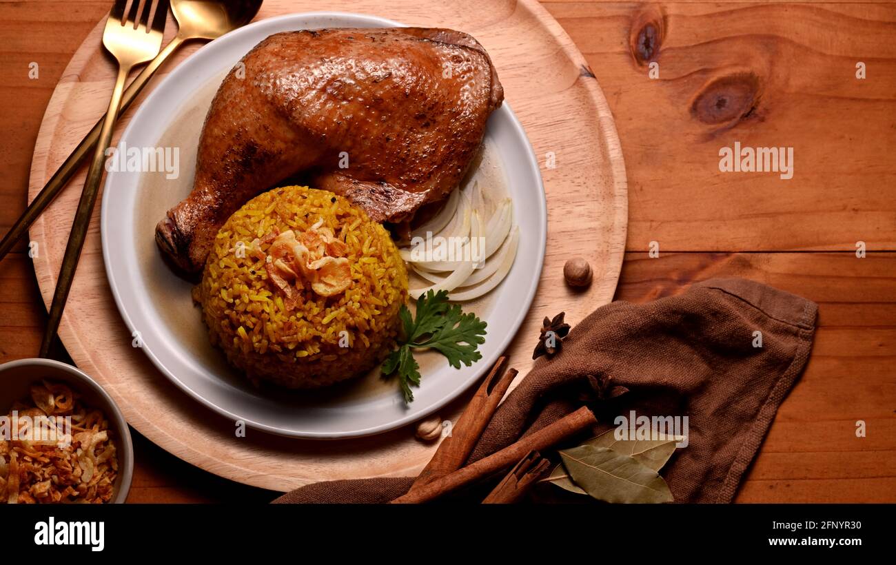 Top view of delicious chicken biryani with rice marinated in spices on ...