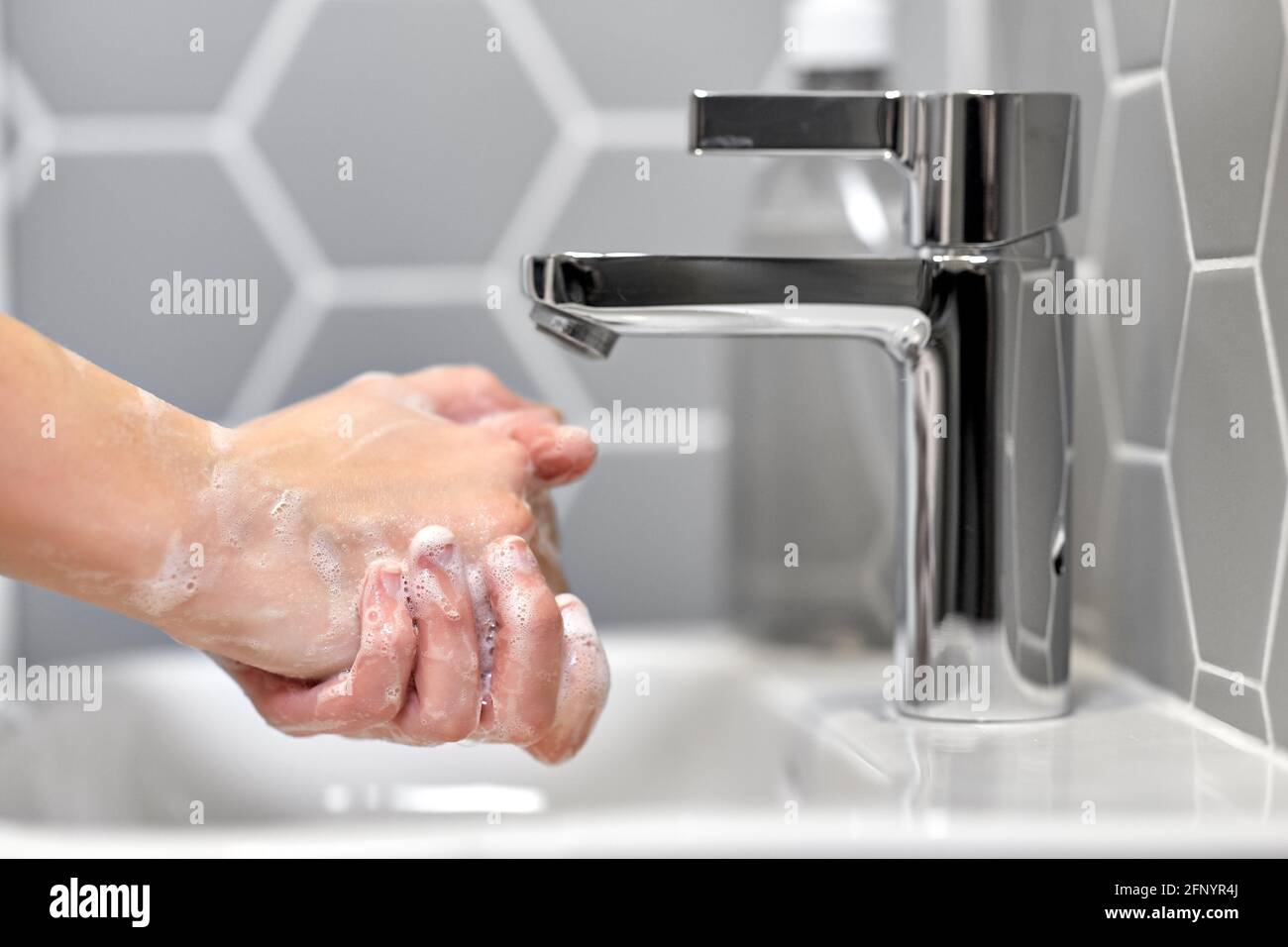close up of woman washing hands with liquid soap Stock Photo - Alamy