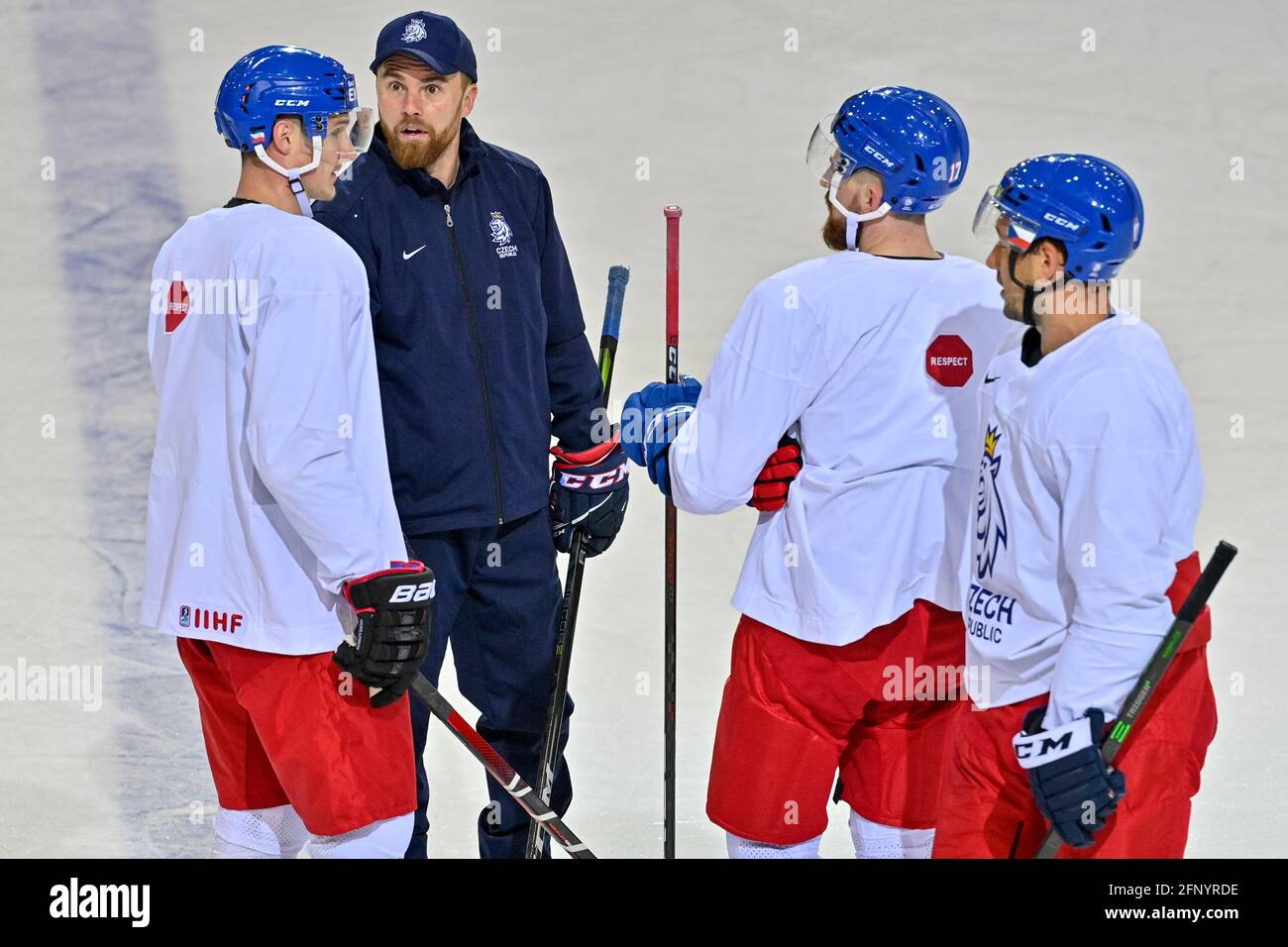 Riga, Latvia. 20th May, 2021. L-R Dominik Kubalik, head coach Filip ...
