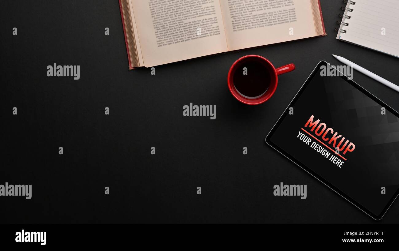 Top view of study table with tablet, book, stationery and copy space in ...