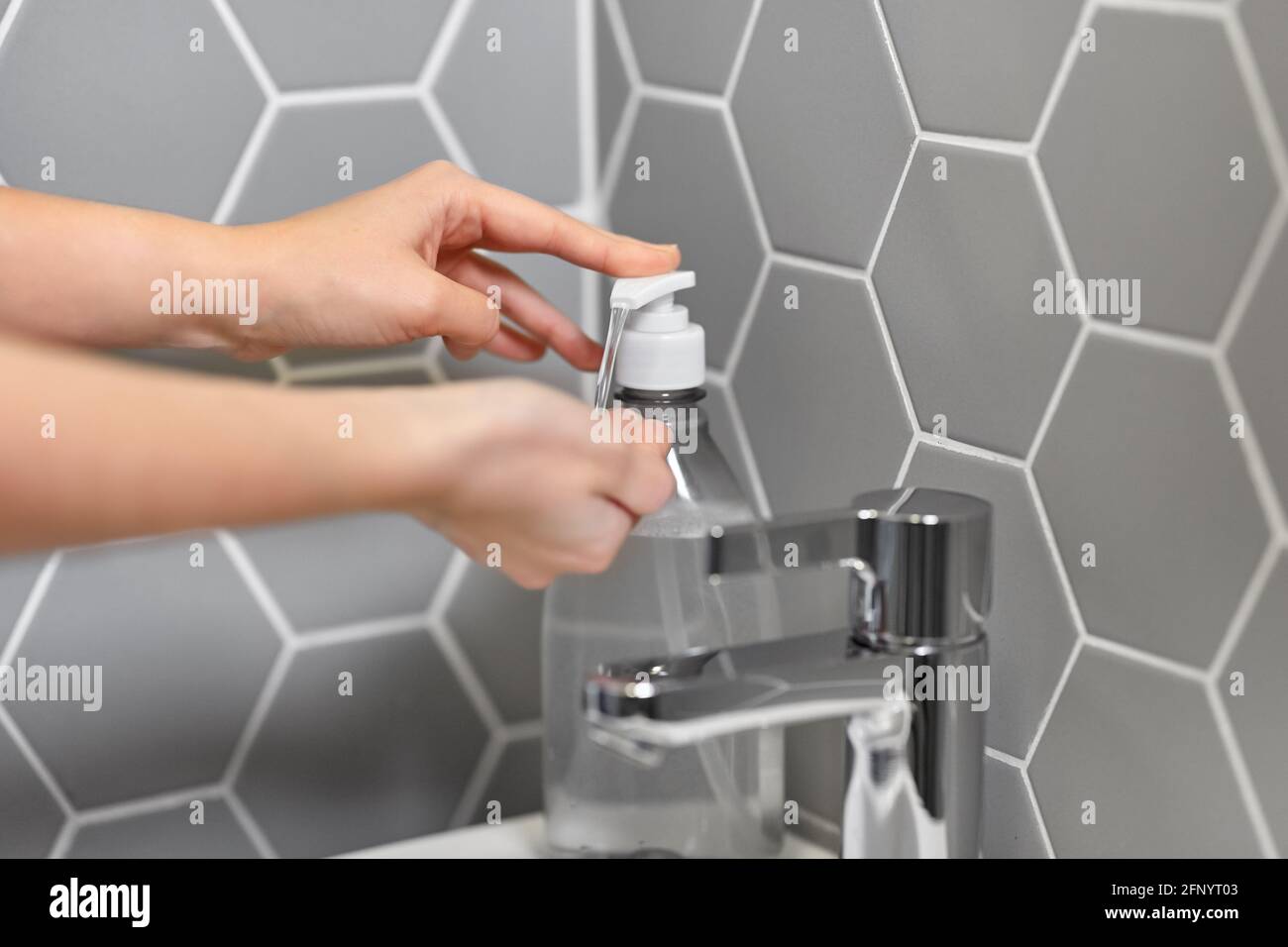 close up of woman washing hands with liquid soap Stock Photo - Alamy