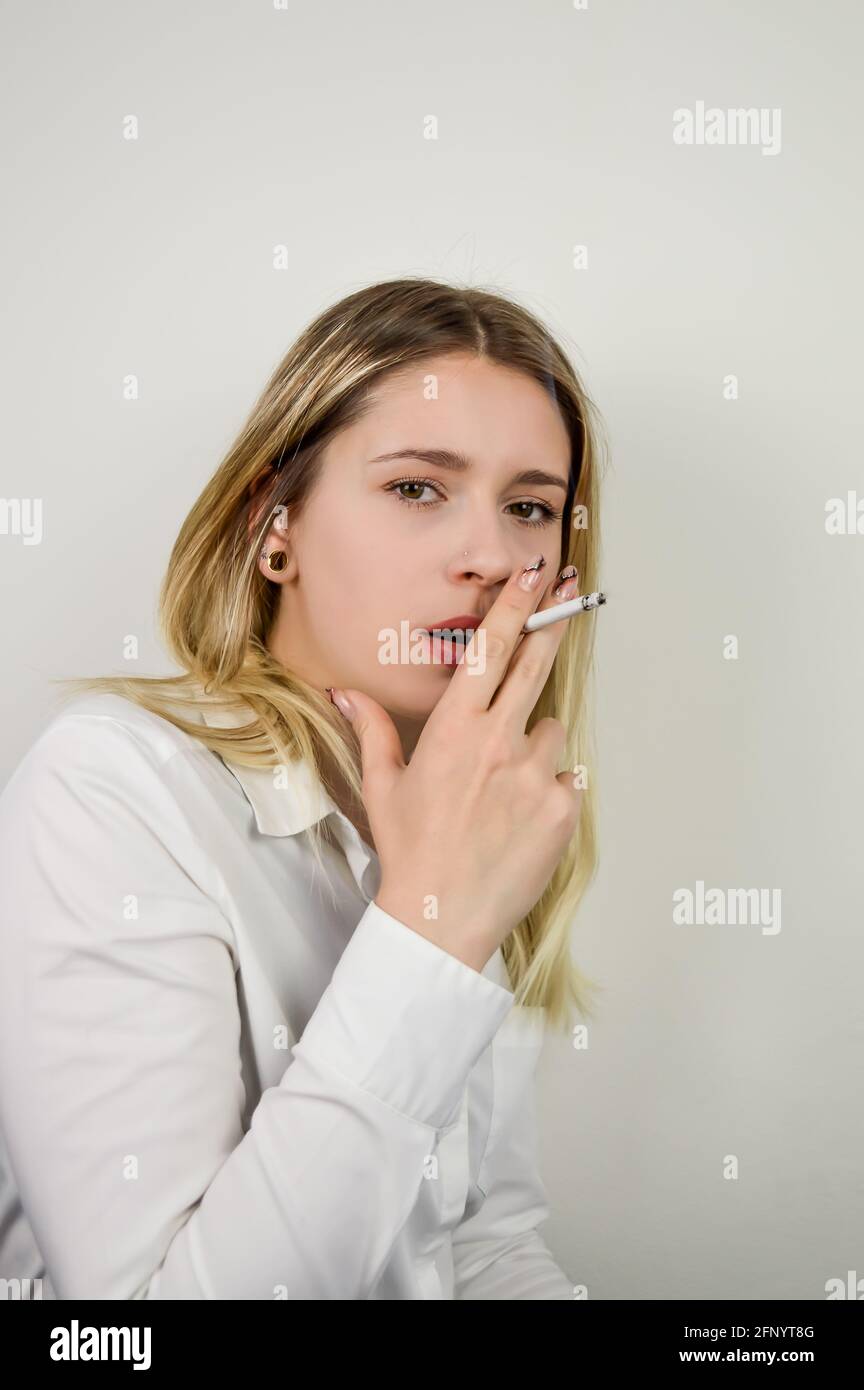 Inhaling smoke hi-res stock photography and images - Alamy