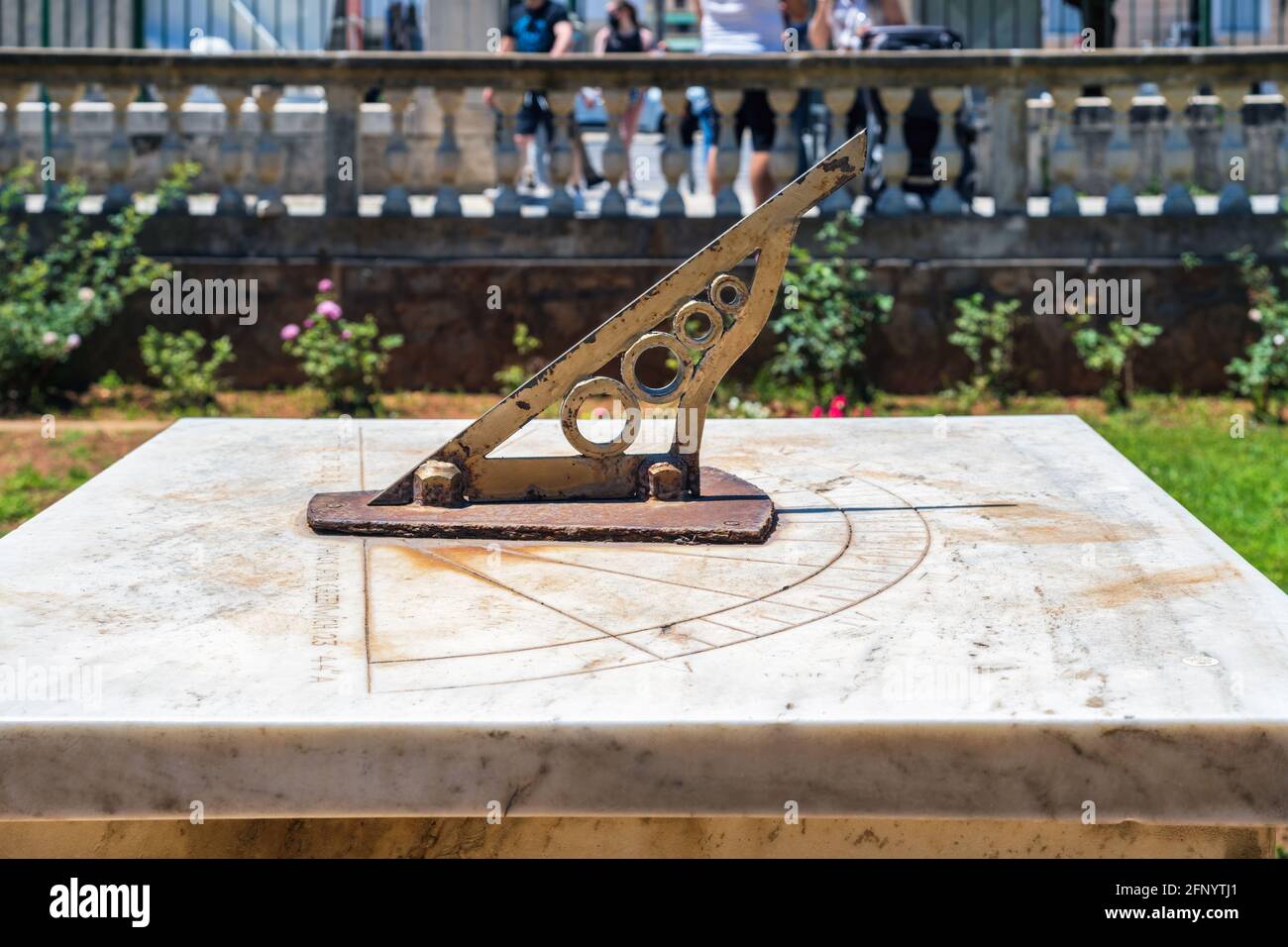 Old sundial at the National Garden public park, at the center of Athens ...