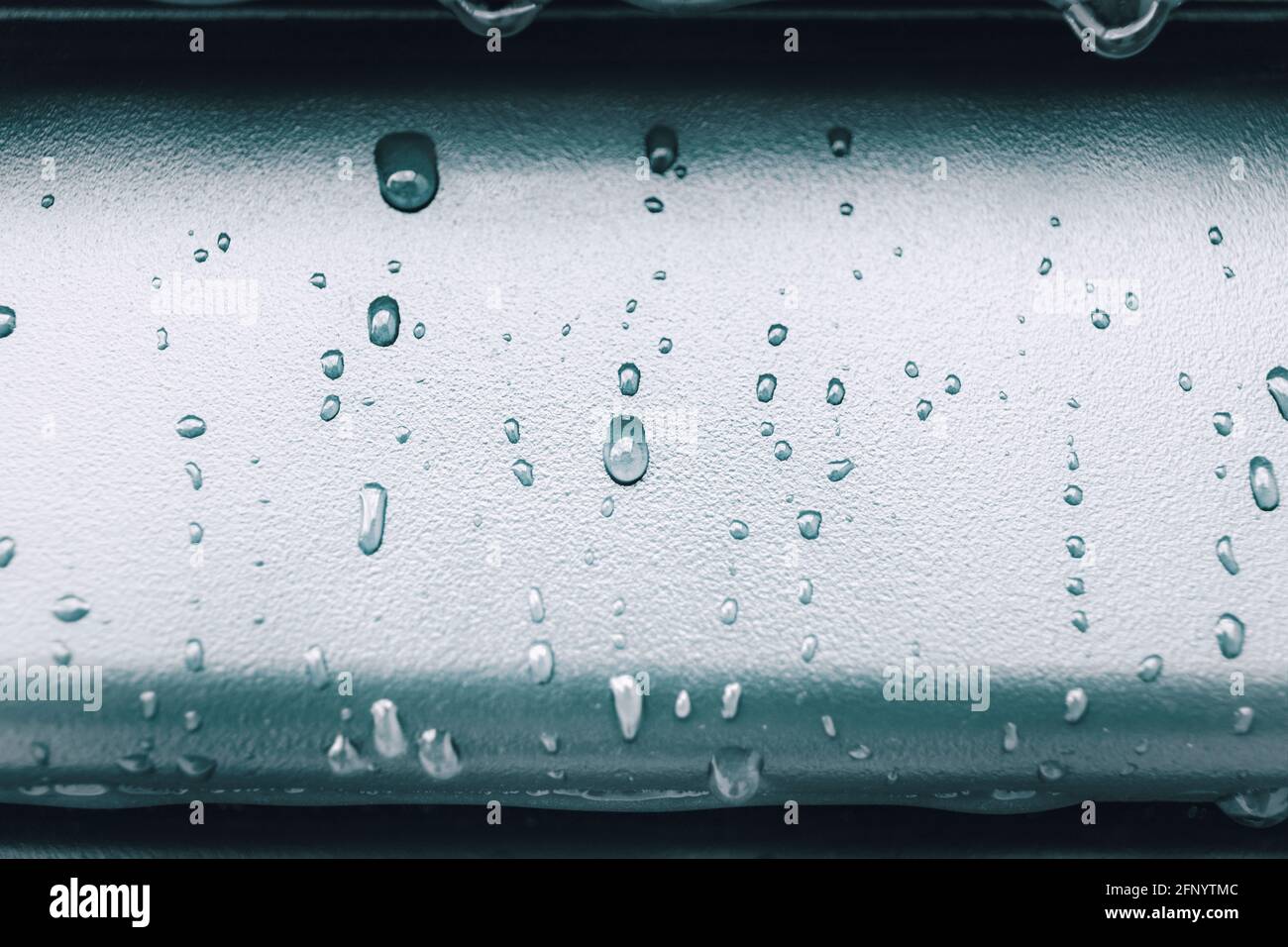 Raindrops and drip water on the shutter, detail Stock Photo - Alamy