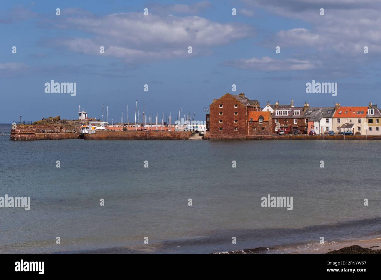 the traditional buildings around the harbour seen from West Bay,North ...