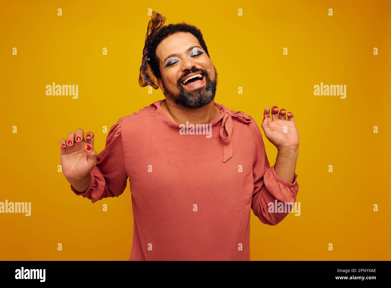 Non conforming person standing on yellow background. Genderqueer ...