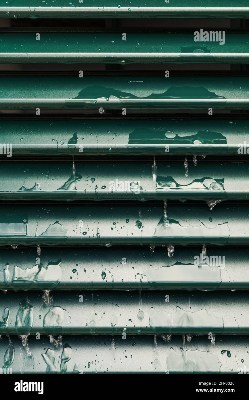 Raindrops and drip water on the shutter, detail Stock Photo - Alamy