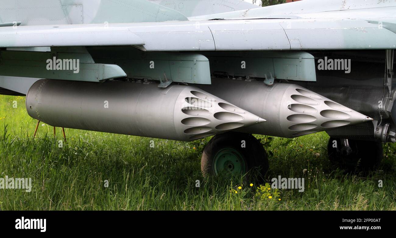 Supersonic jet fighter with rocket launcher on wings at airbase Stock ...