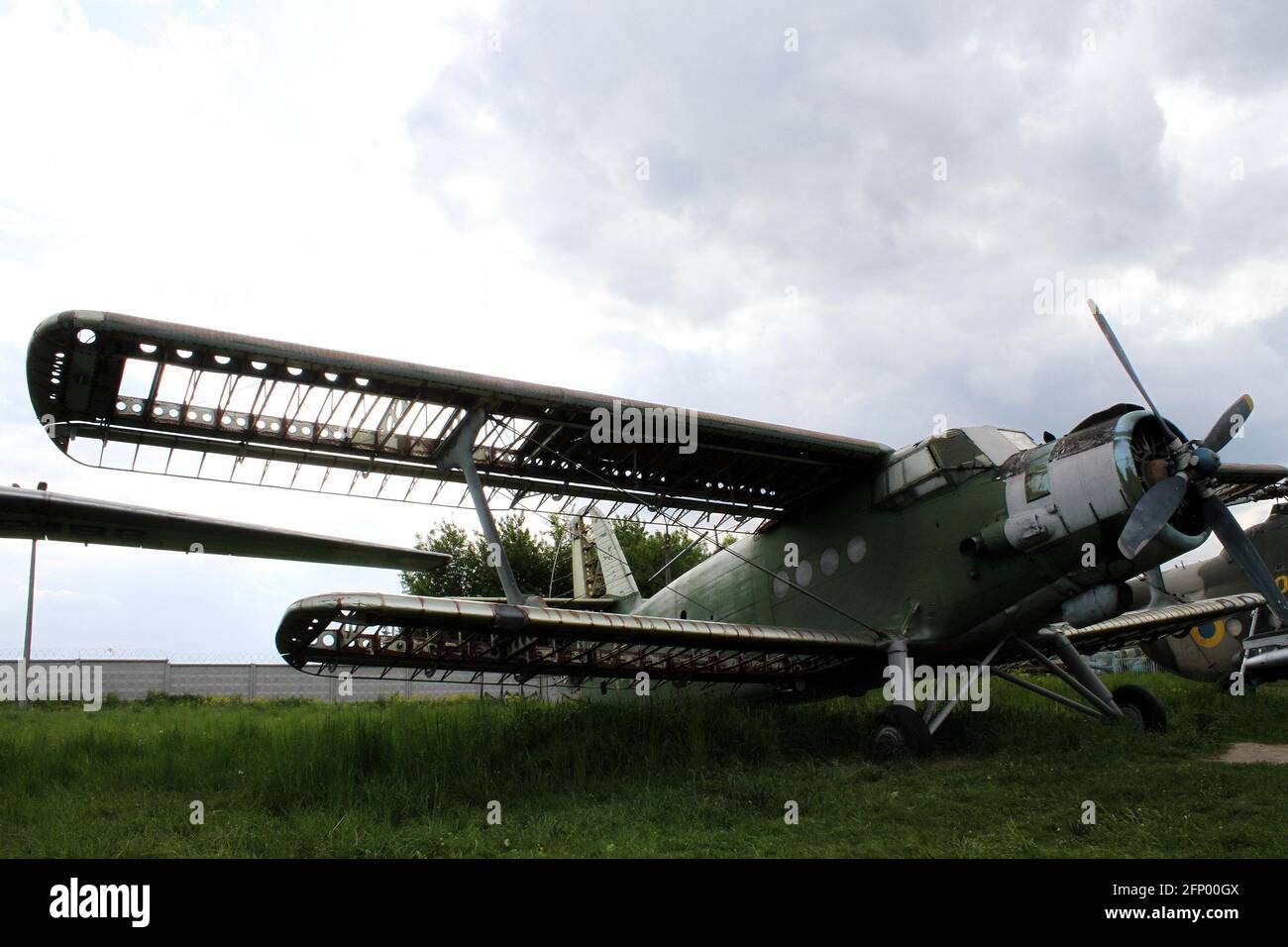 Damaged Vintage Biplane On A Ground At Aircraft Graveyard Stock Photo ...