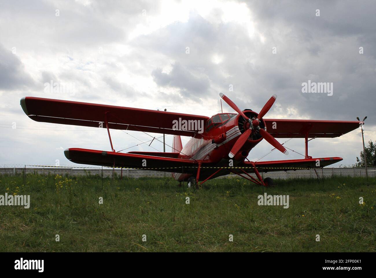 Red Civil Biplane On A Grass At Airfield Stock Photo - Alamy