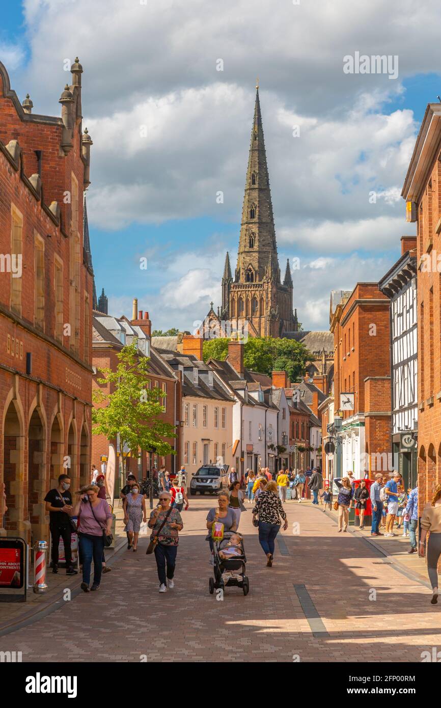 View of Lichfield Cathedral from busy town centre street, Lichfield ...