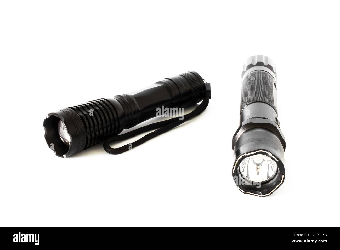 Small black flashlight on a white background. Lantern Stock Photo - Alamy