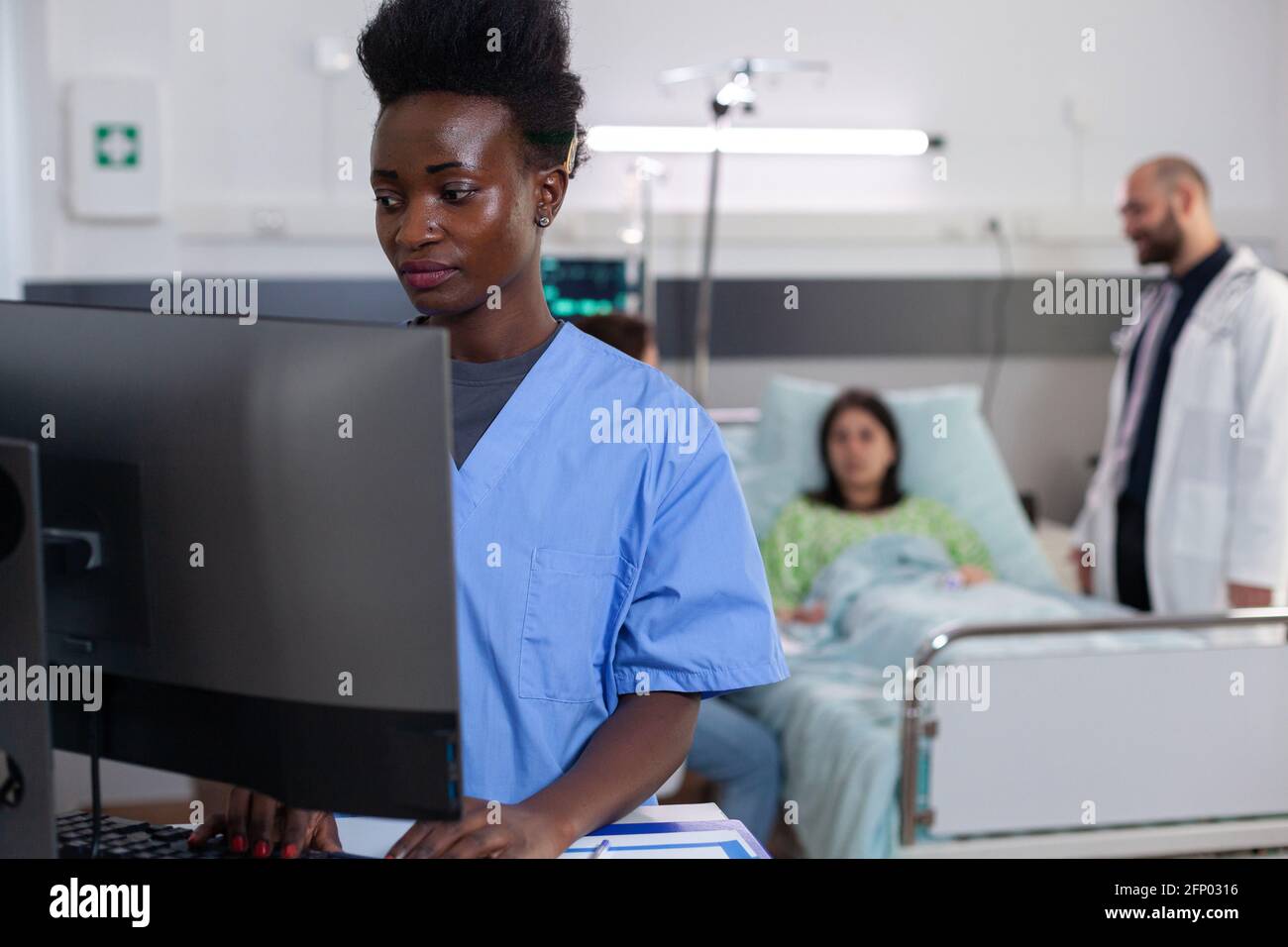 Woman asisstant typing medical hi-res stock photography and images - Alamy