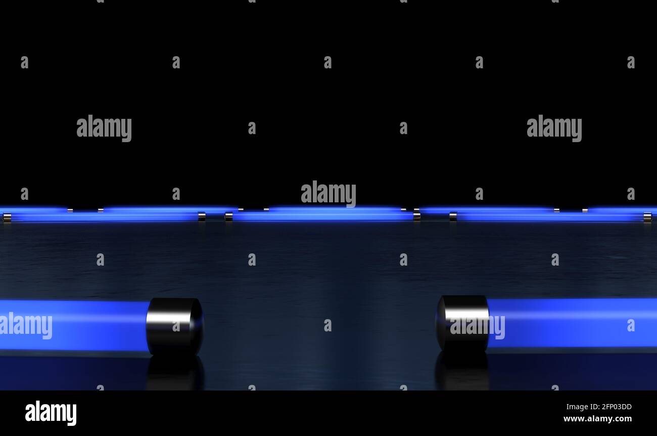 A black reflective stage setting with silver designs lit by a circular ...