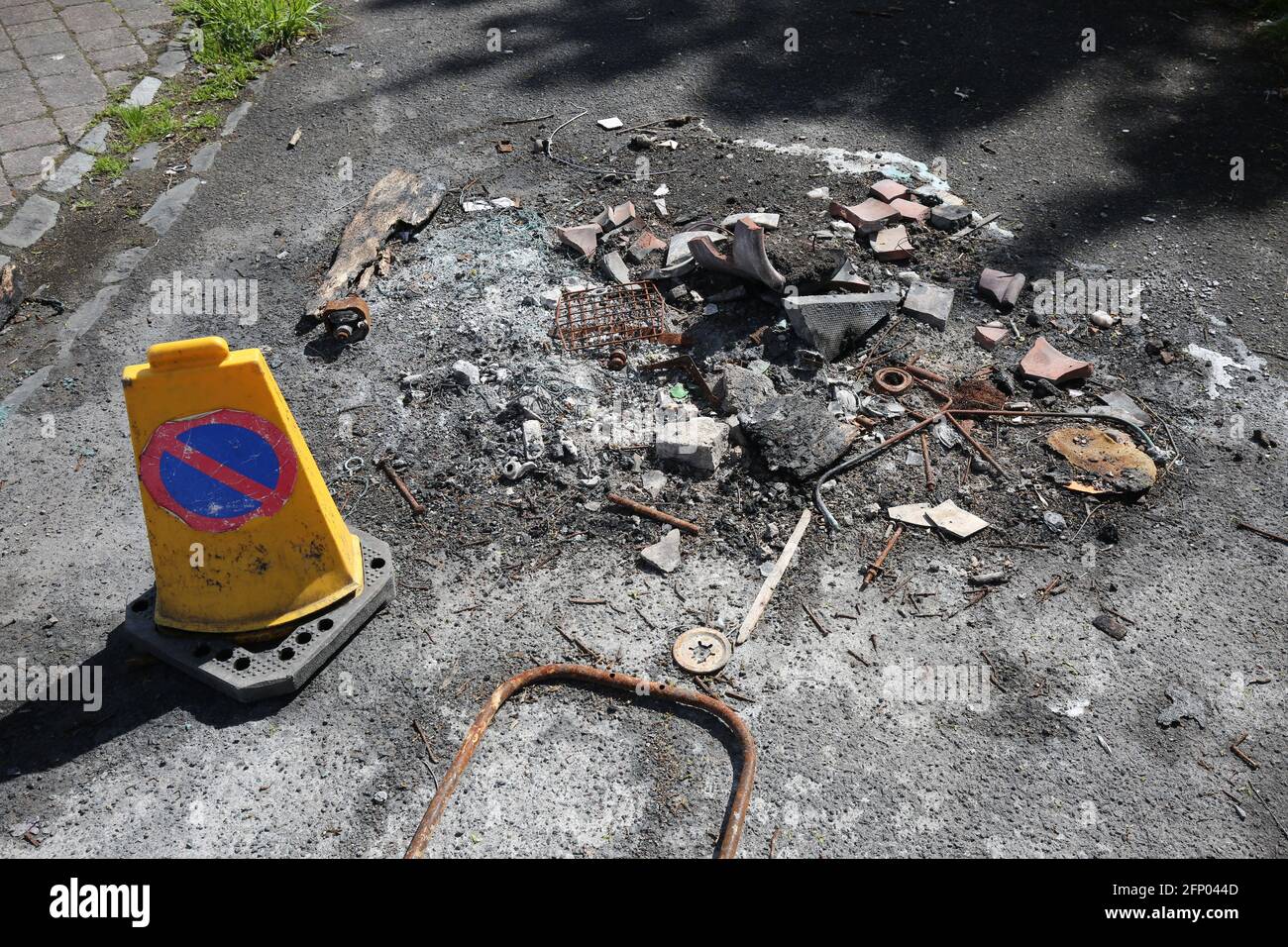 Litter bin destroyed by fire set by vandals with traffic cone warning ...