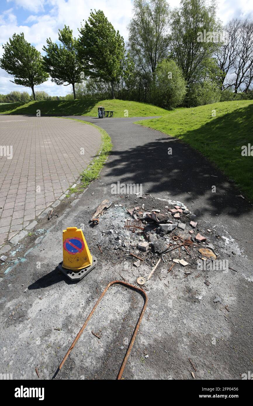 Litter bin destroyed by fire set by vandals with traffic cone warning ...