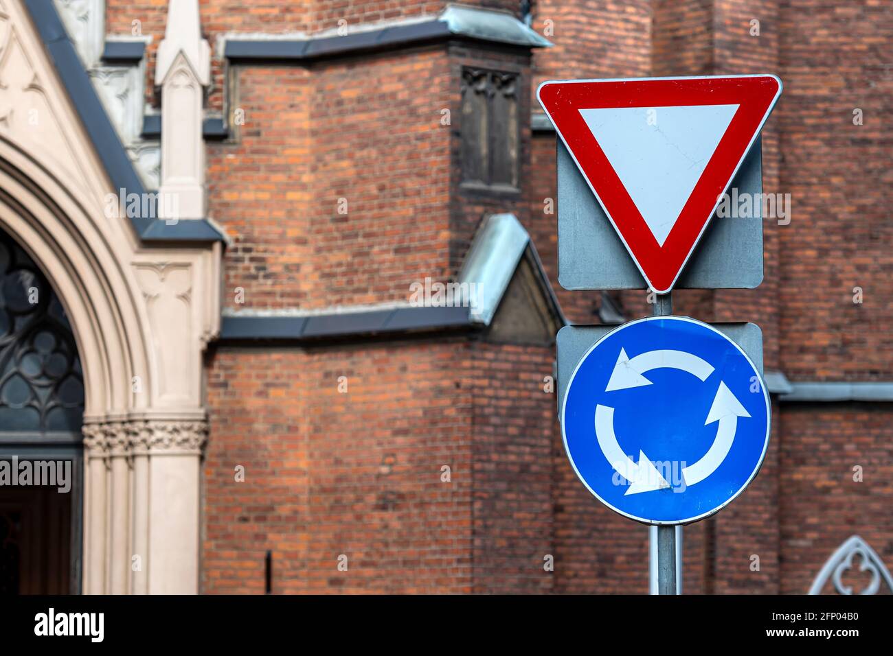 the sign is circular motion and give way on the background of the ...