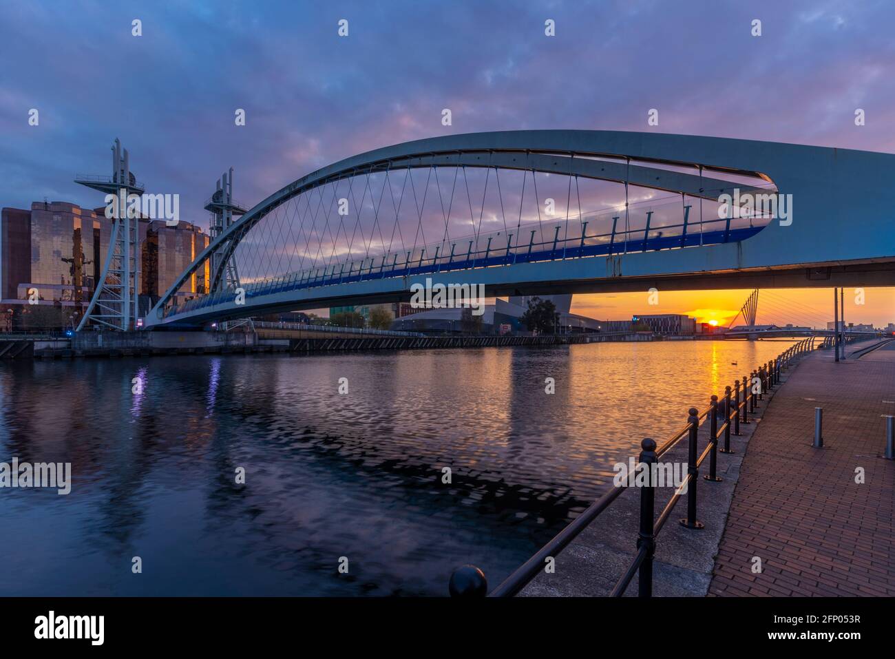 View of pedestrian bridge and MediaCity UK, Salford Quays, Manchester ...