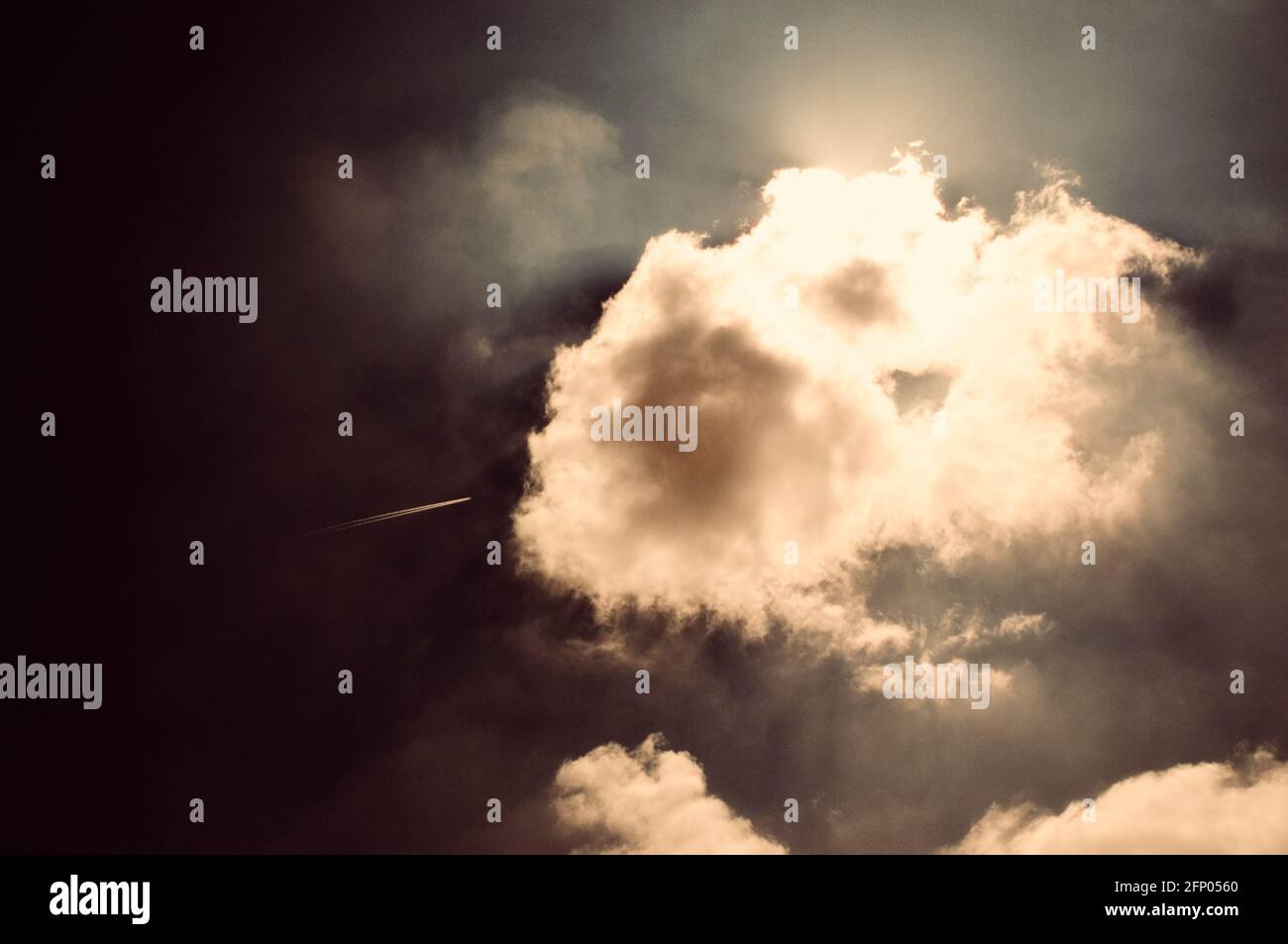 Aircraft flying into cloud Stock Photo - Alamy