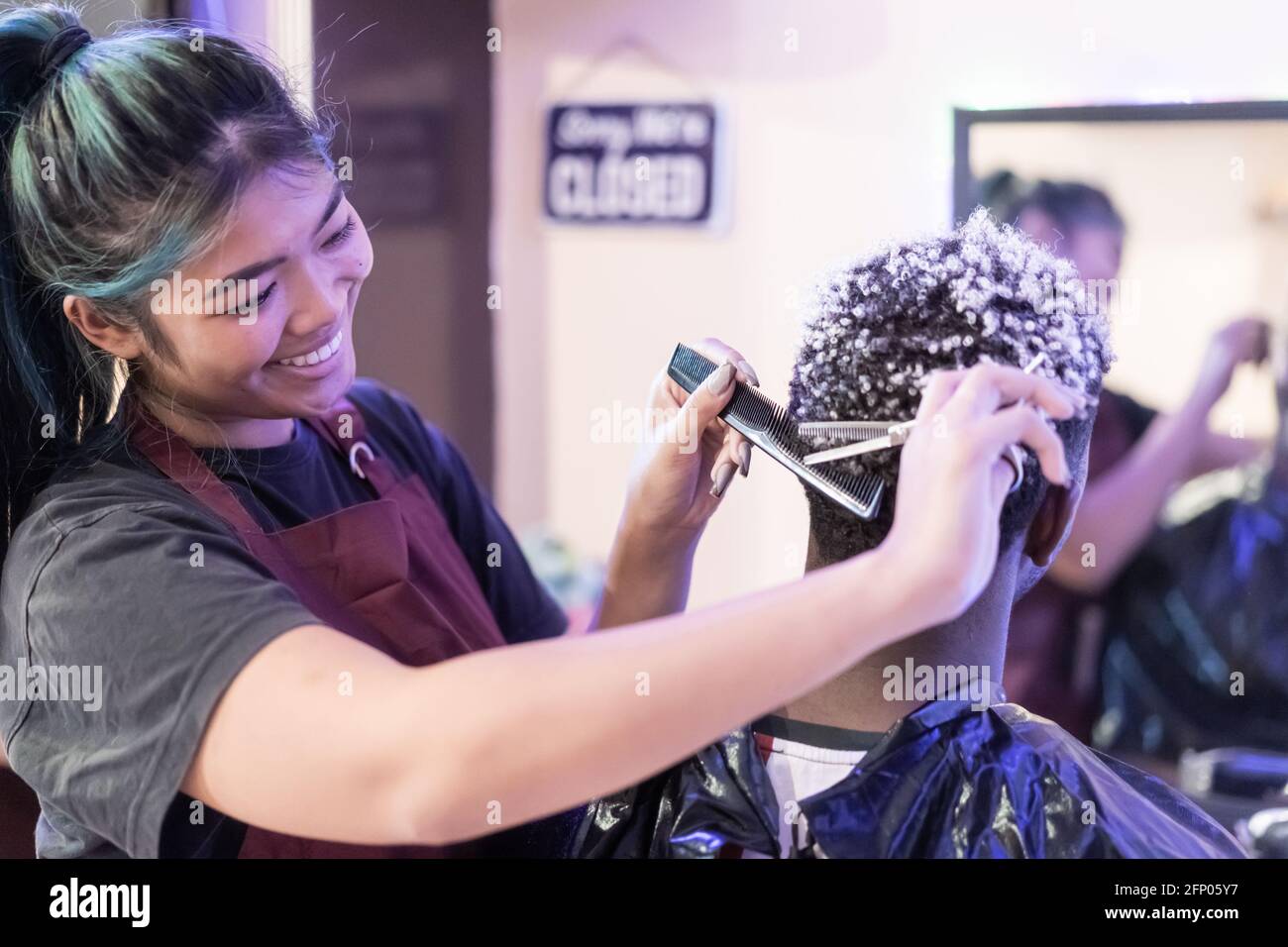Woman hairstylist at work hi-res stock photography and images - Alamy