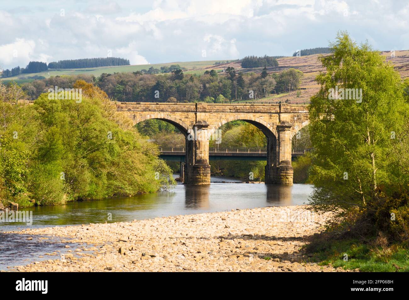 The old stone railway viaduct at Haltwhistle crossing the river South ...