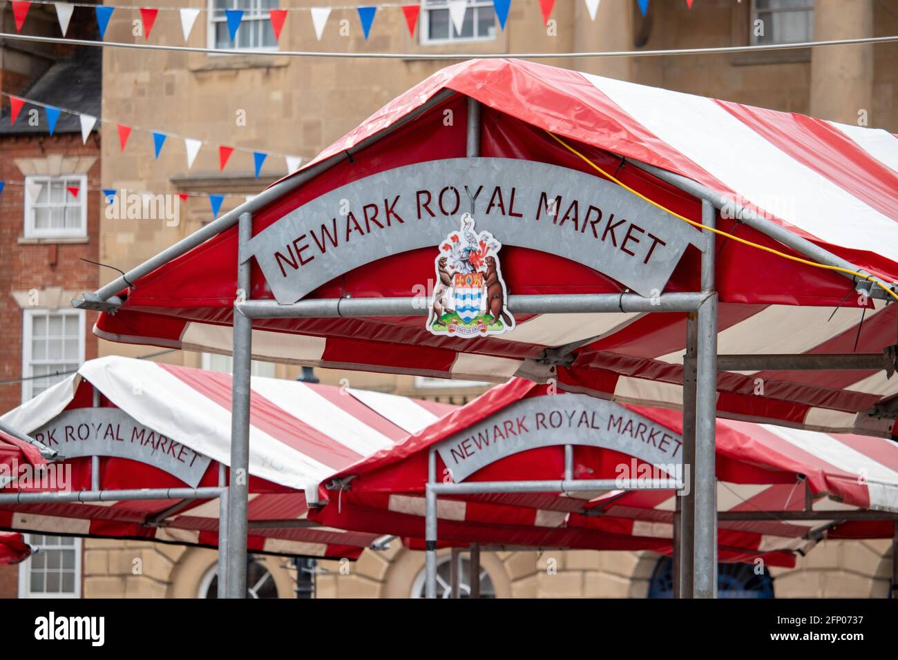 The stalls of Newark Royal Market in the market square. Newark has ...