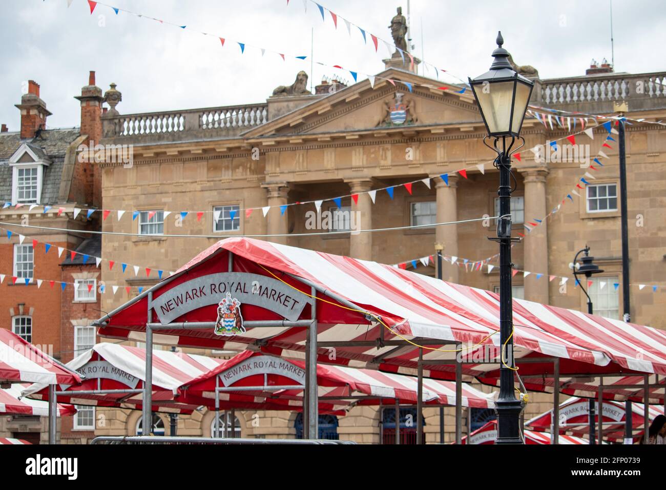 The stalls of Newark Royal Market in the market square. Newark has ...