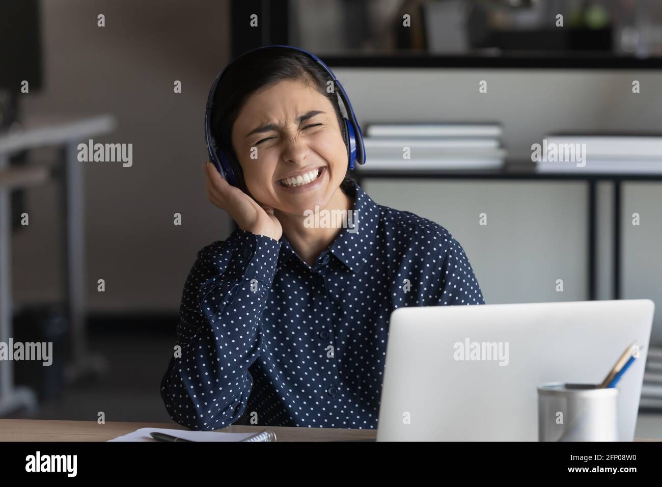 Smiling Indian woman laugh talking on video call Stock Photo - Alamy