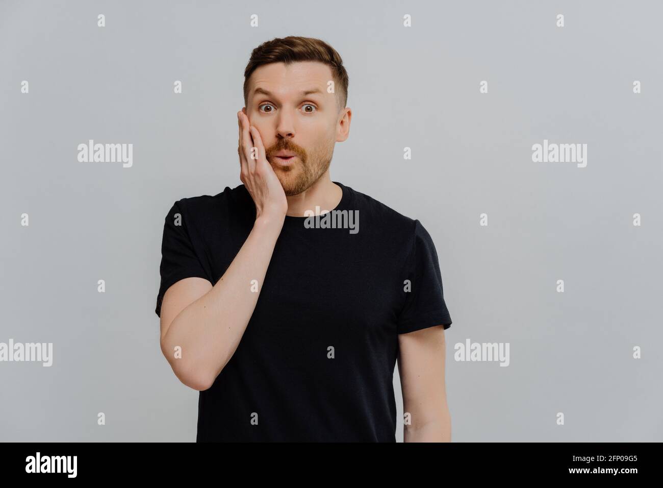 Surprised ginger man with wow face expression Stock Photo - Alamy