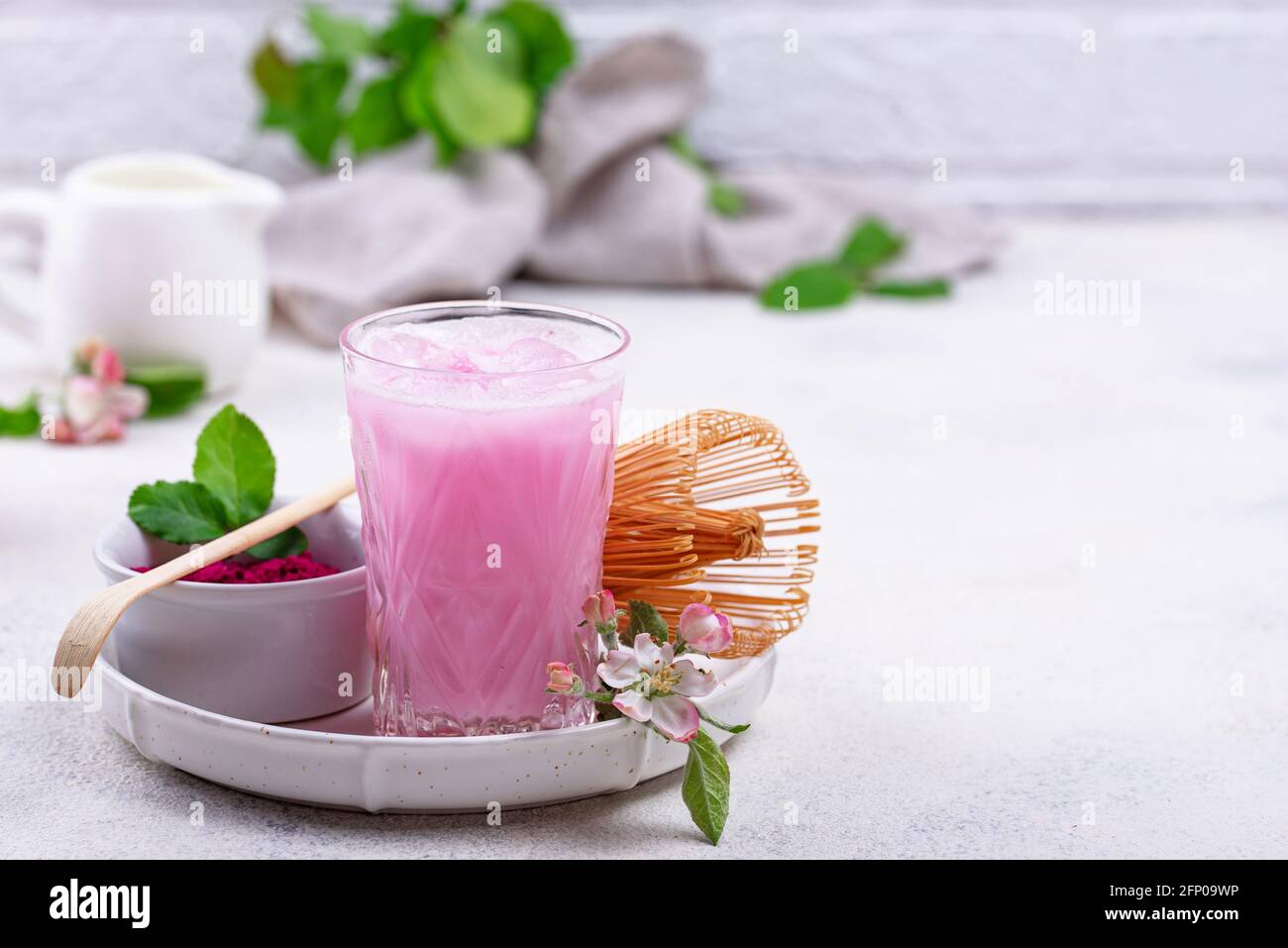 Pink matcha ice latte with milk Stock Photo - Alamy