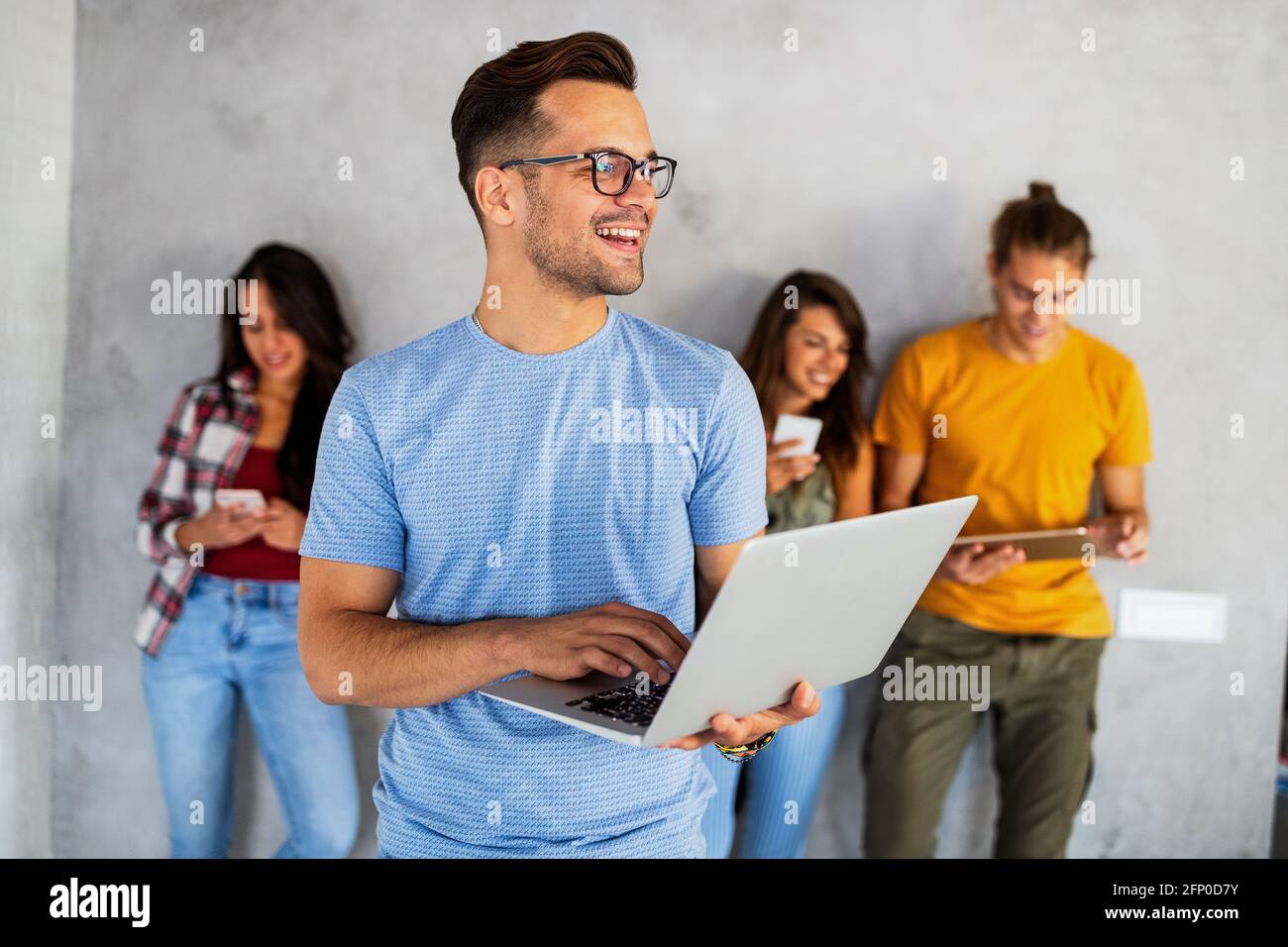 Group of happy friends, people smiling and connected by digital devices ...