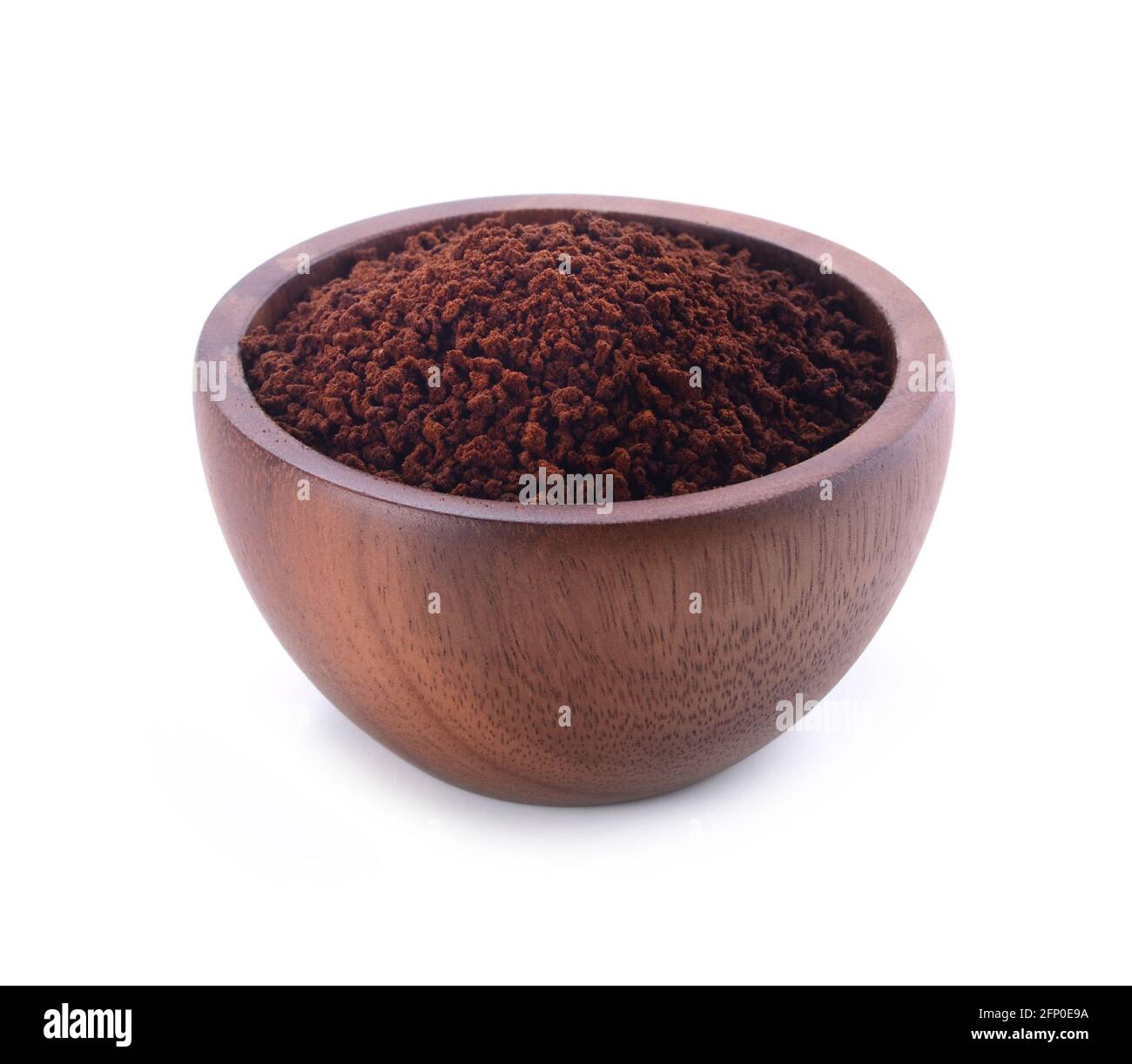 Coffee powder burst in bowl on white background Stock Photo - Alamy