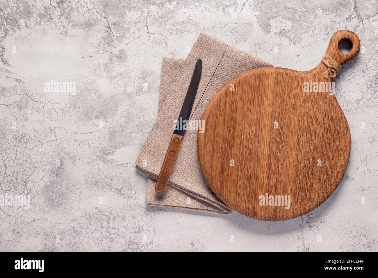 cutting board on a concrete table, top view Stock Photo - Alamy