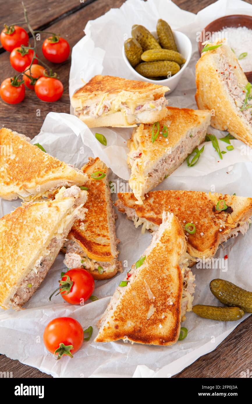 Grilled sandwich with tuna and melted cheese Stock Photo - Alamy