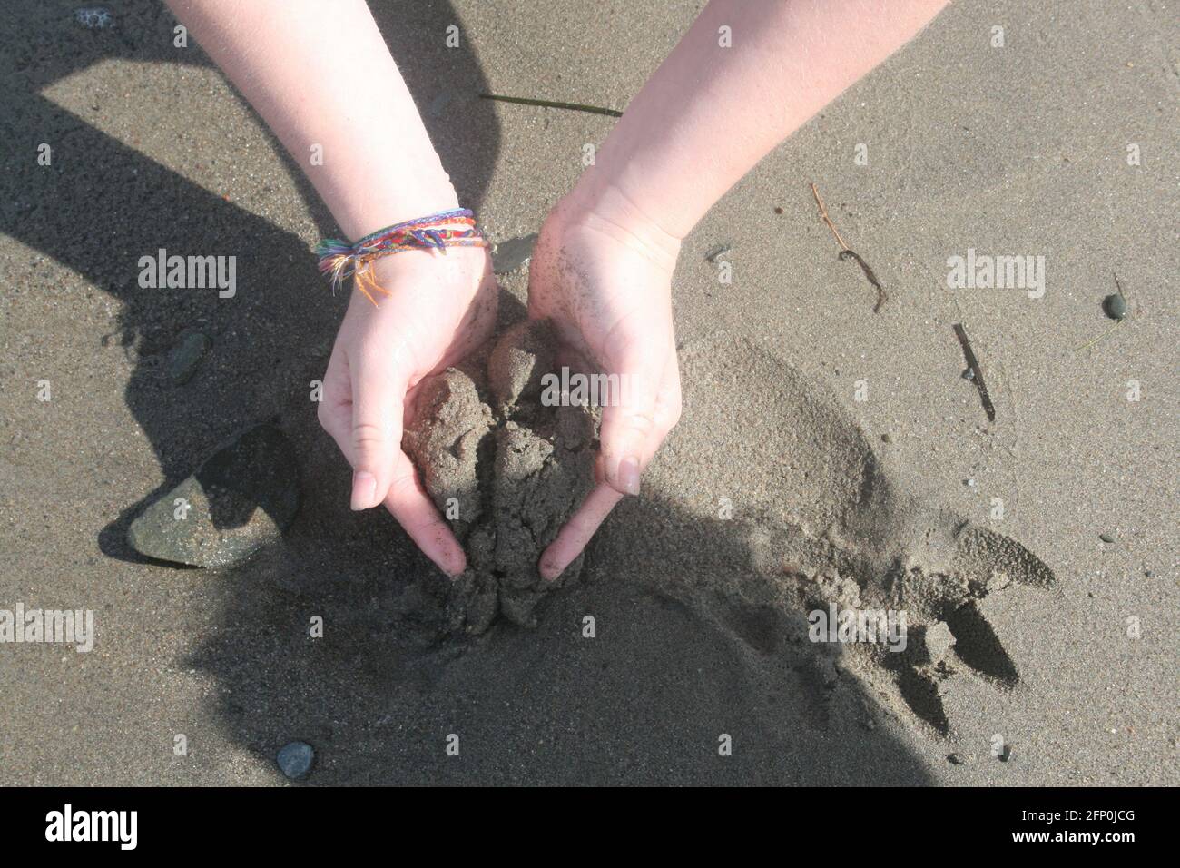 Scooping sand hi-res stock photography and images - Alamy
