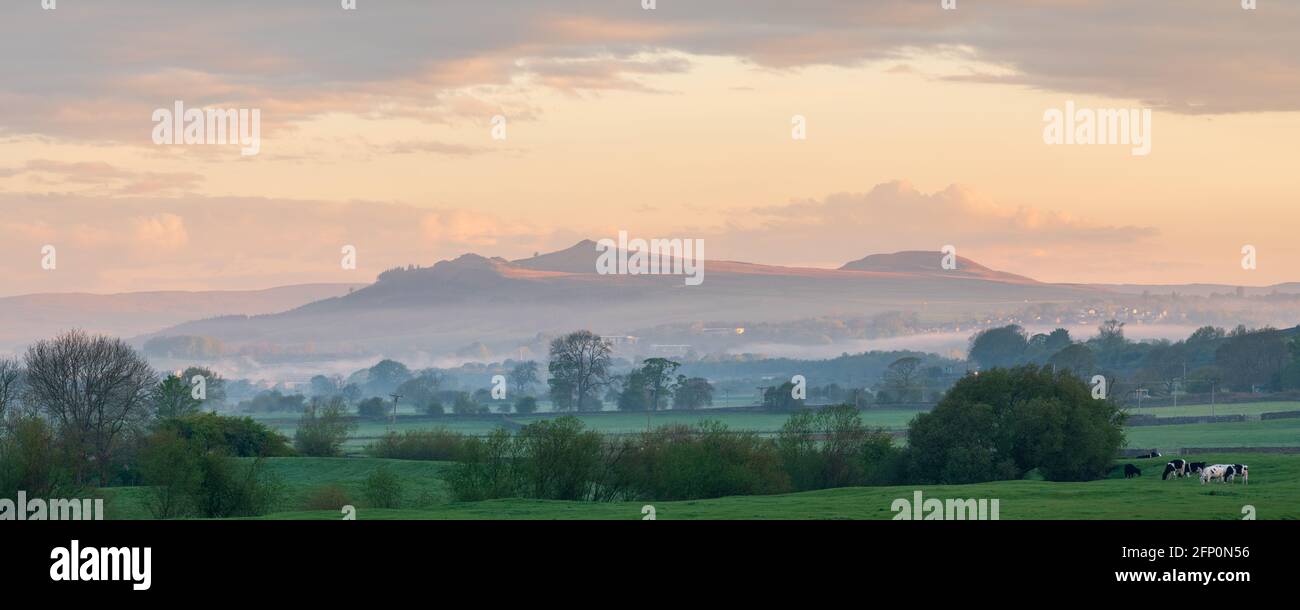 Embsay Crag and Sharp Haw rise above the mist on a beautiful morning ...