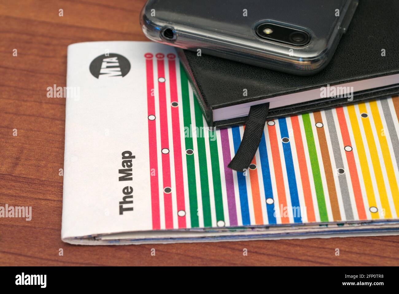 NYC subway map, Notebook and Smart phone Stock Photo - Alamy