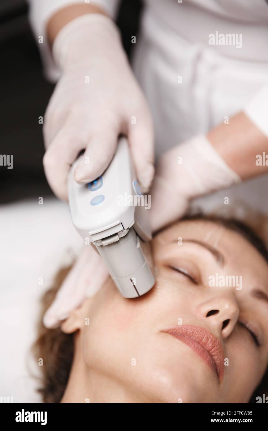 Non-surgical face lifting. SMAS lifting ultrasonic. Facelift. The ...