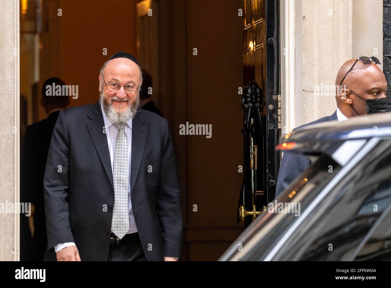 London, UK. 20th May, 2021. Chief Rabbi Ephraim Mirvis leaves 10 ...