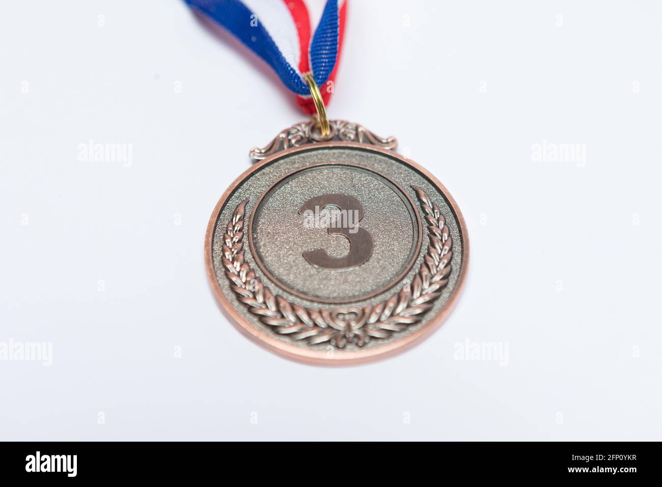 Bronze medal of sporting achievement for the third classified, on a ...
