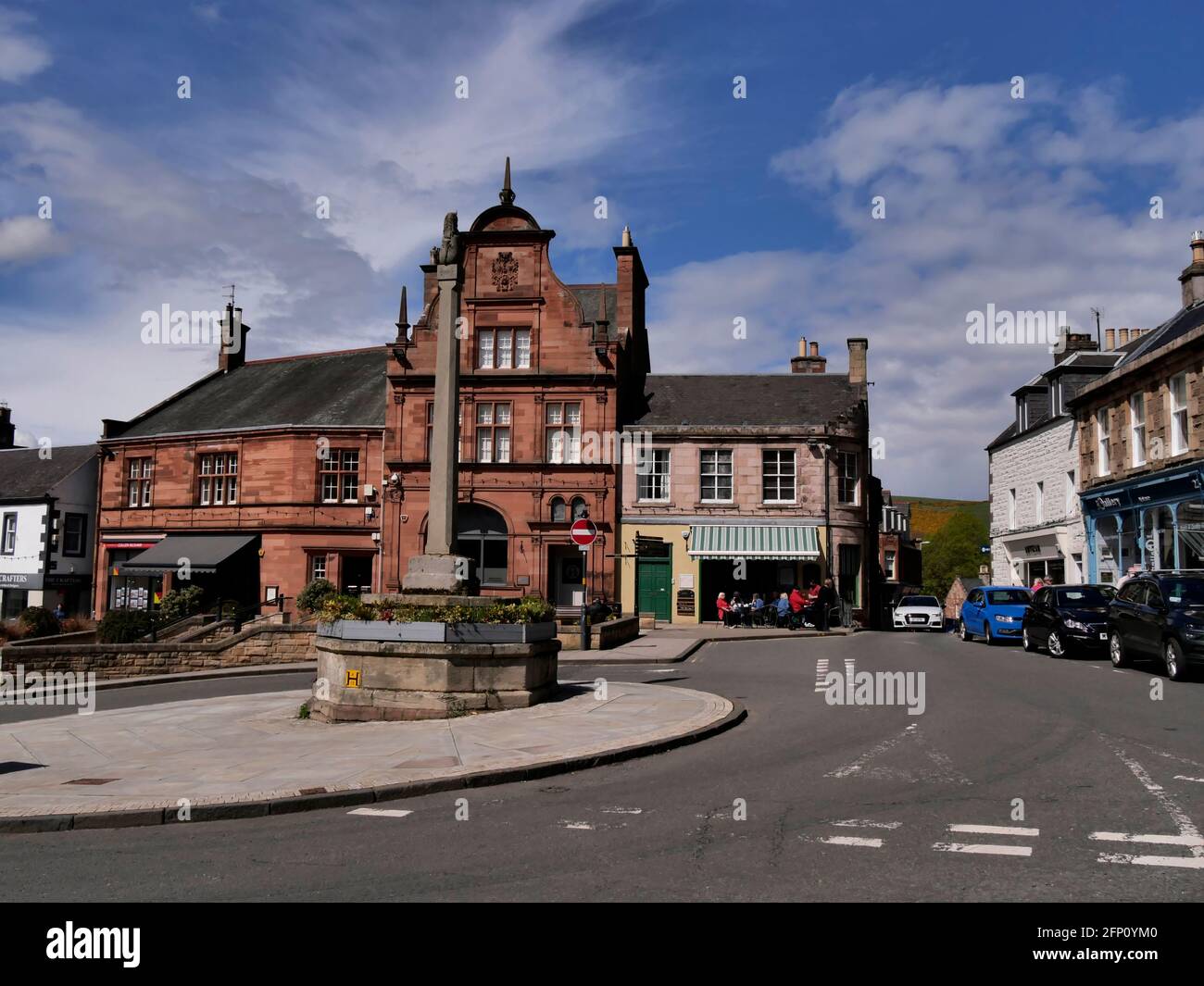 people sit outside a cafe at Market Cross,Melrose,Scottish Borders ...